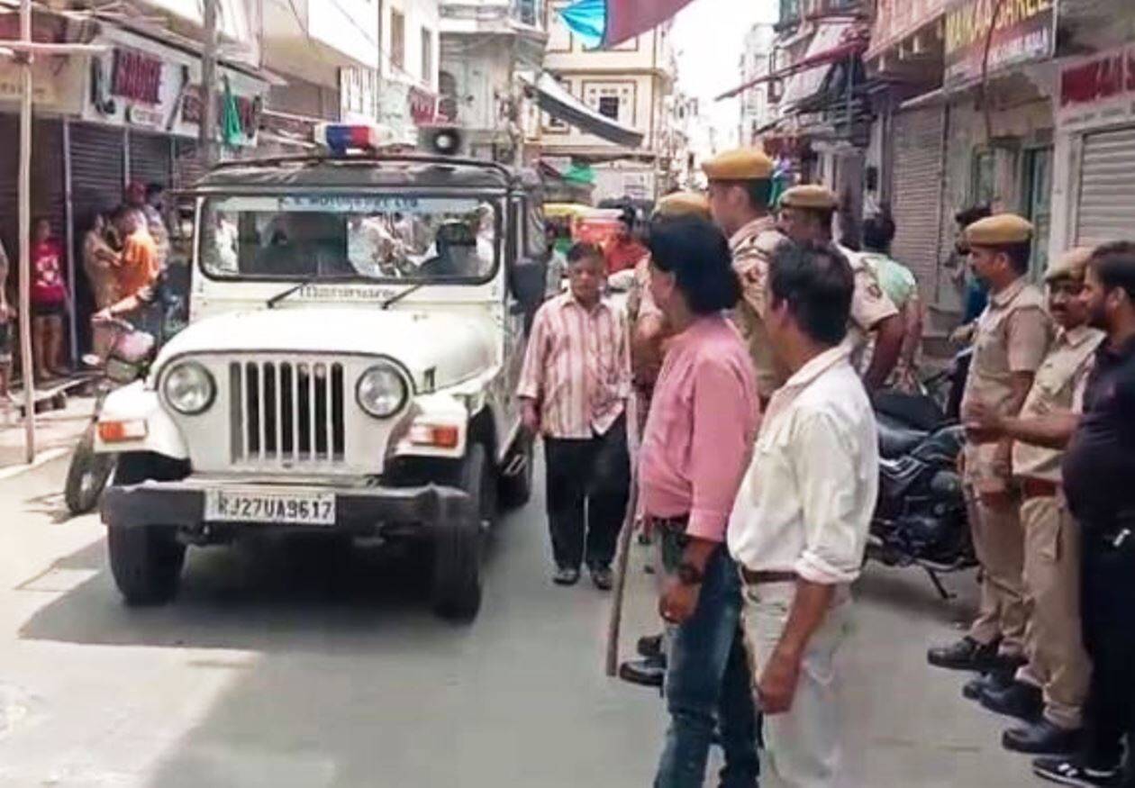 Objectionable material spread outside temple by dog